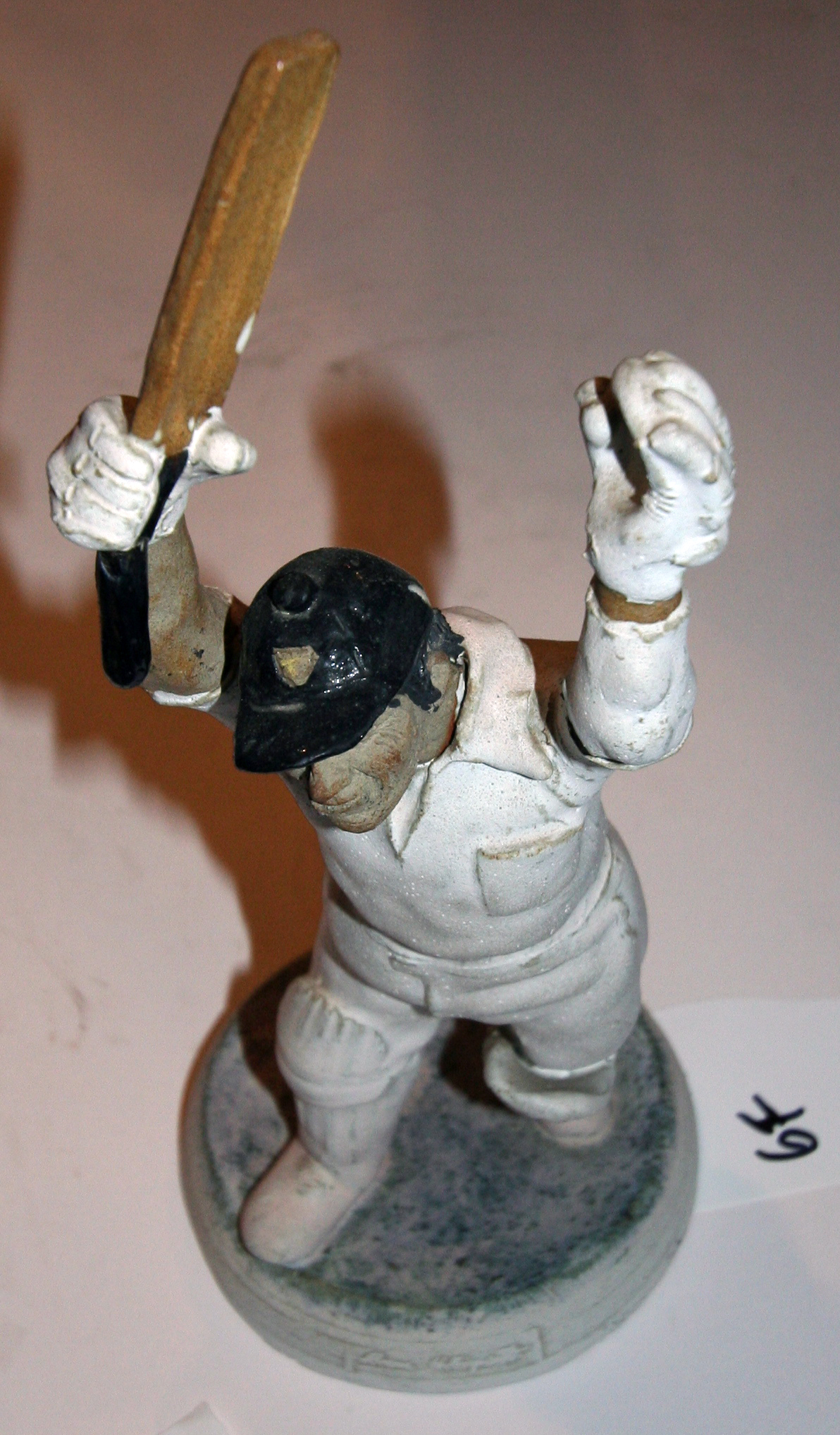 Pottery figure bat – Somerset Cricket Museum